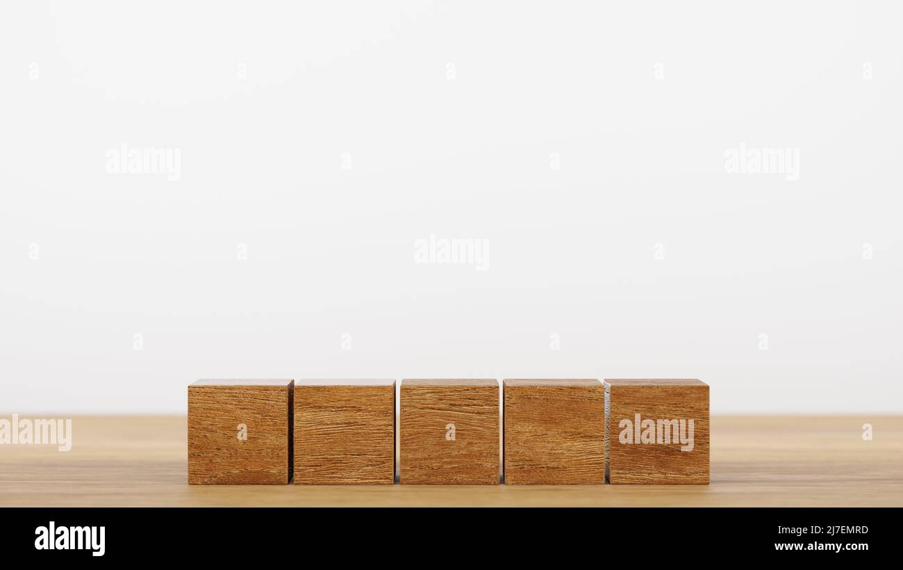 Row of 5 wooden cube block with empty space for put alphabet on top ...