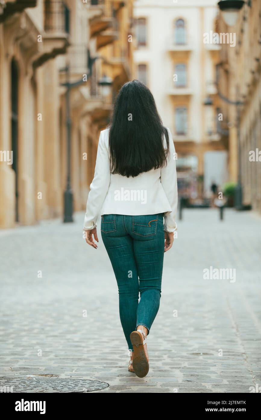 Indian women walking away hi-res stock photography and images - Alamy