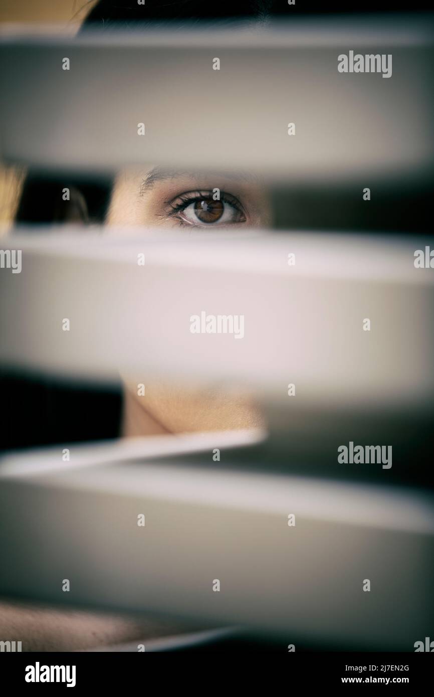 Scared woman hiding Stock Photo - Alamy