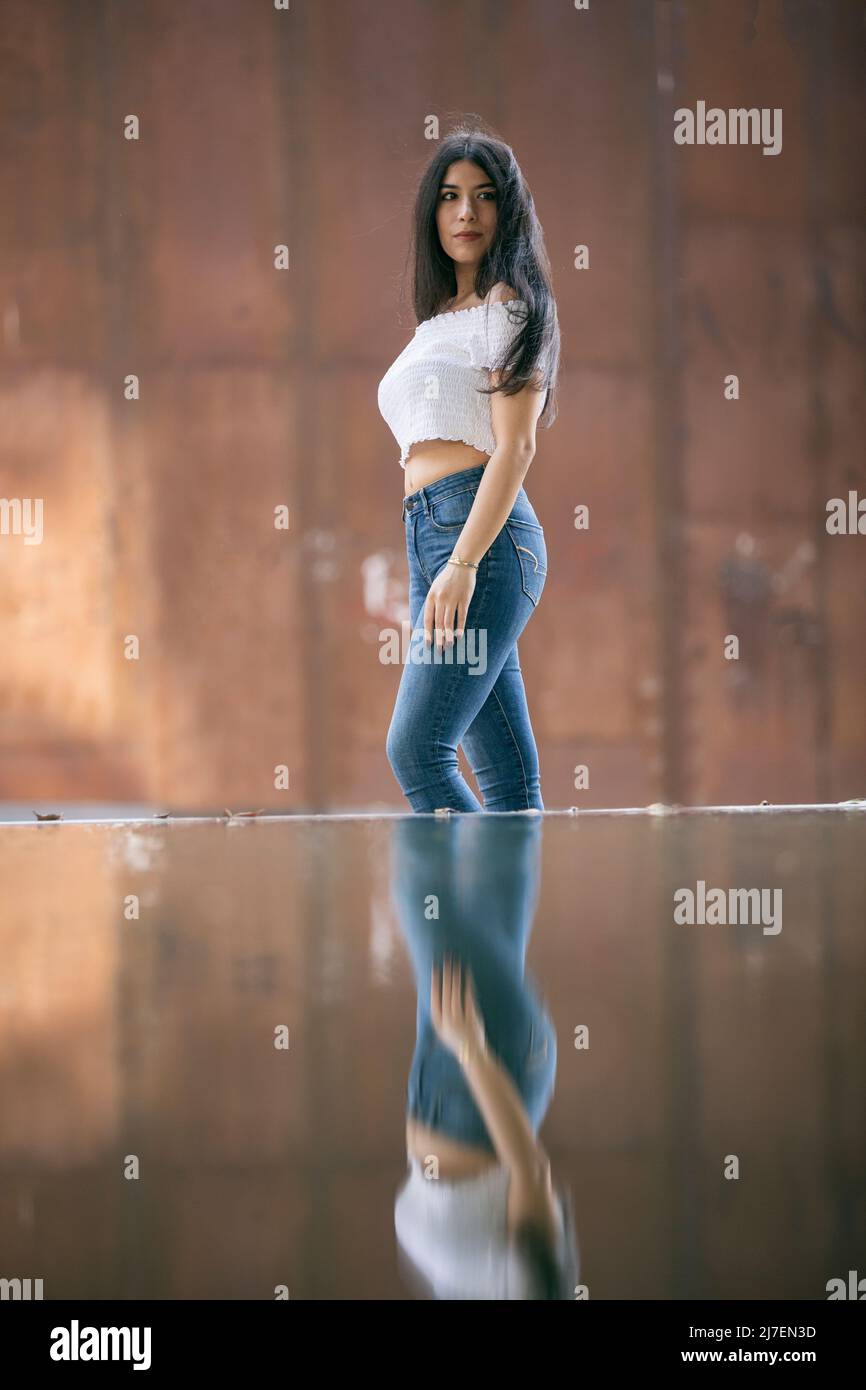 Woman's reflection in water Stock Photo - Alamy