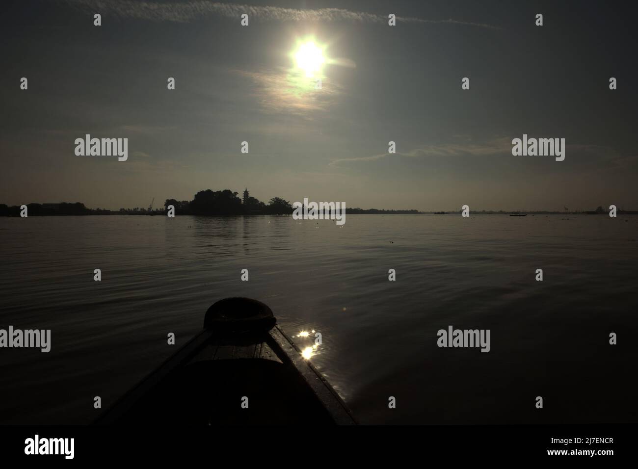 Pulo Kemaro (Kemaro island) and its pagoda are seen from a boat that ...