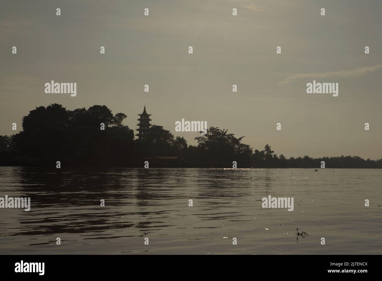 Pulo Kemaro (Kemaro island) and its pagoda are seen from a boat that ...