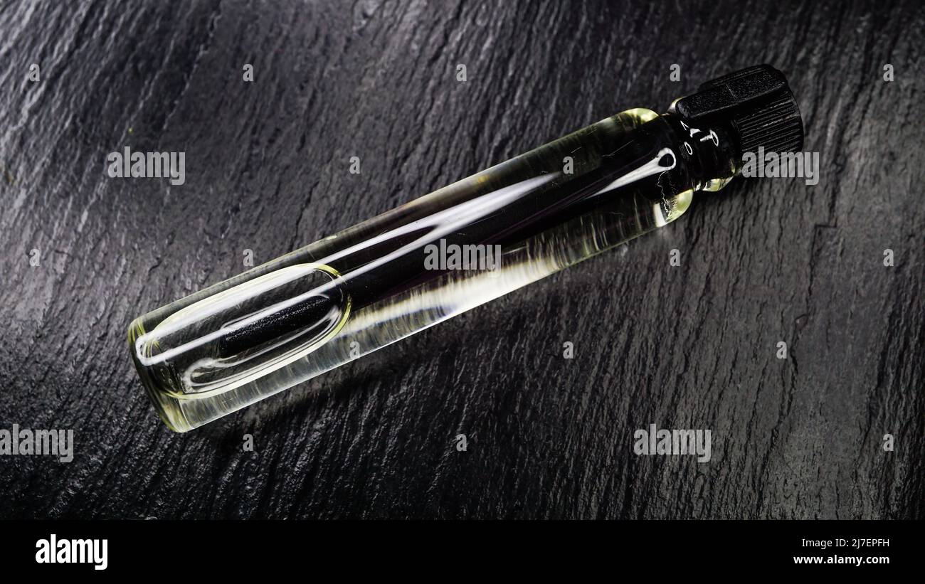 clear glass bottle filled with chemical liquid, object photo shot macro ...