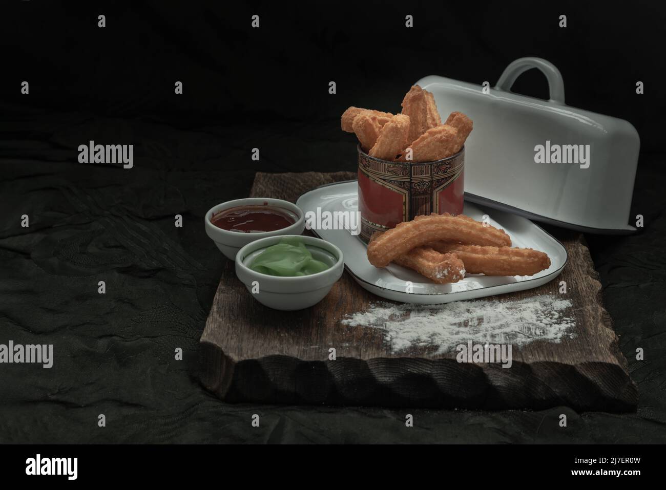 Traditional spanish churros sticks (Fried-dough pastry) Served usually ...