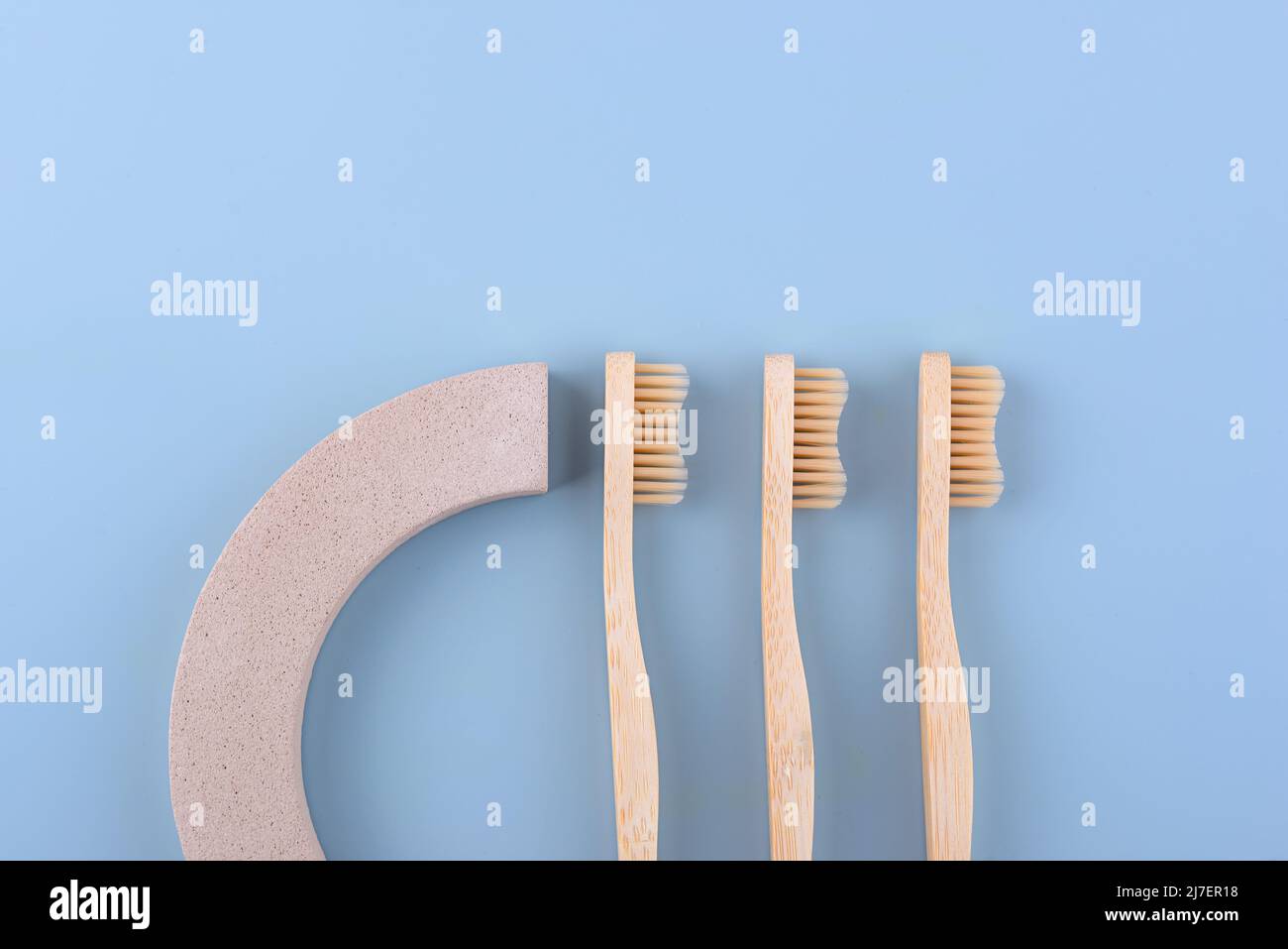 Bamboo toothbrush, zero waste care products Stock Photo - Alamy