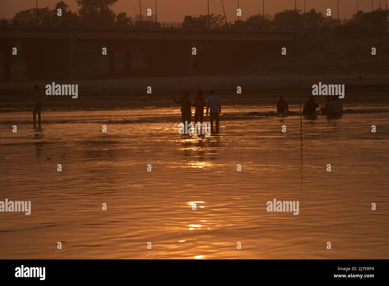 Pakistani people enjoying boating in Ravi River during sunset in Lahore ...