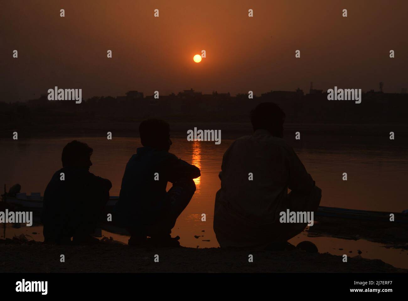 Pakistani people enjoying boating in Ravi River during sunset in Lahore ...
