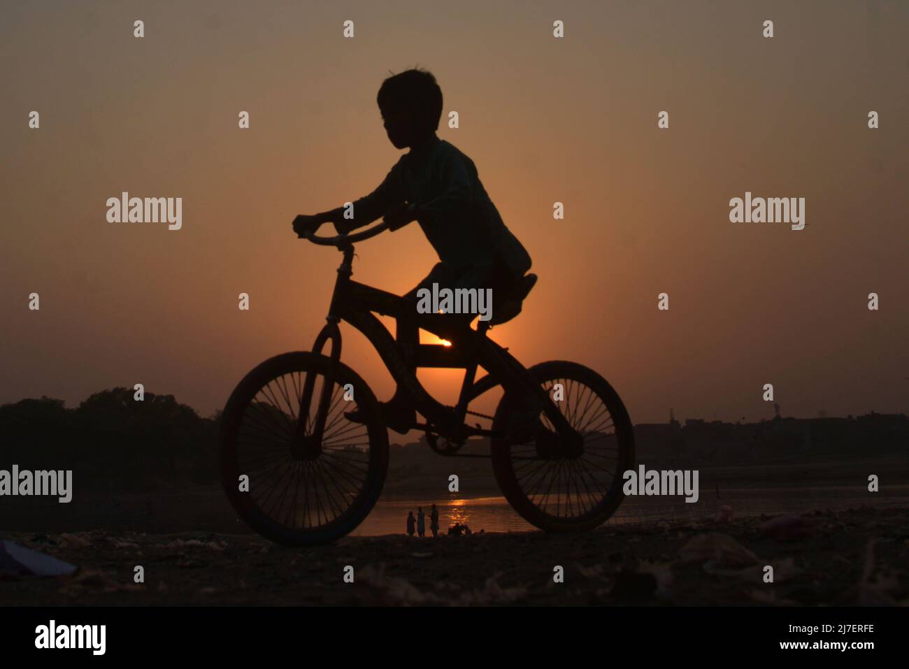 Pakistani people enjoying boating in Ravi River during sunset in Lahore ...