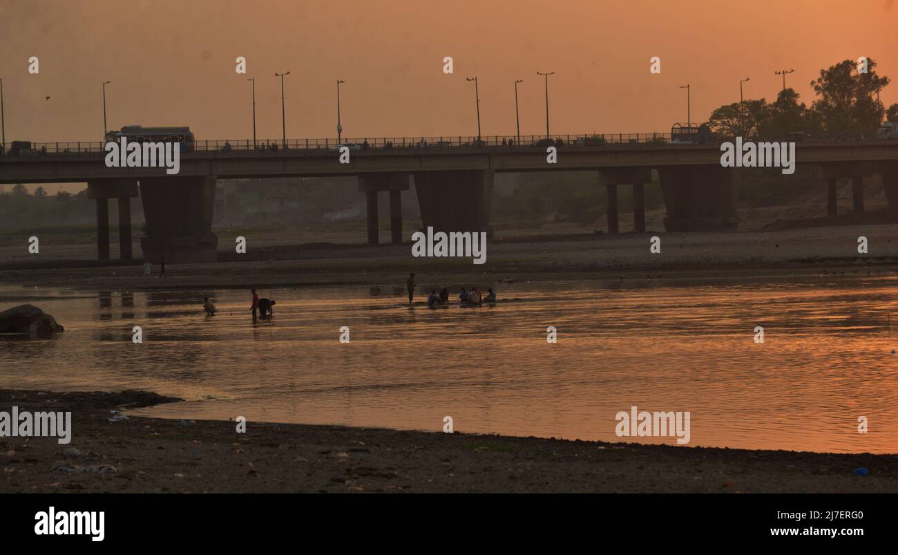 Pakistani people enjoying boating in Ravi River during sunset in Lahore ...