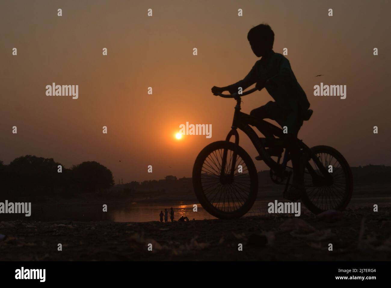 Pakistani people enjoying boating in Ravi River during sunset in Lahore ...