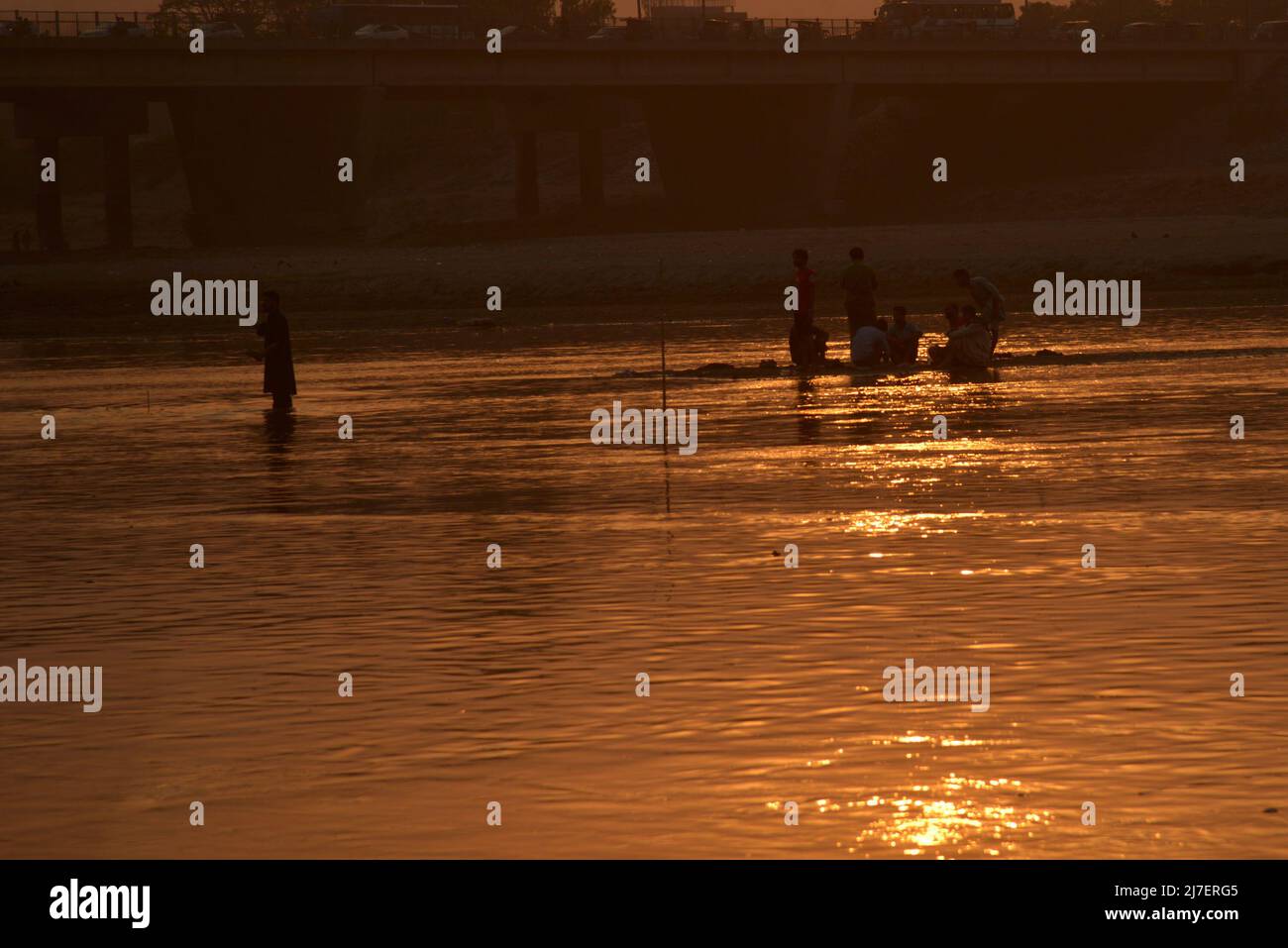 Pakistani people enjoying boating in Ravi River during sunset in Lahore ...