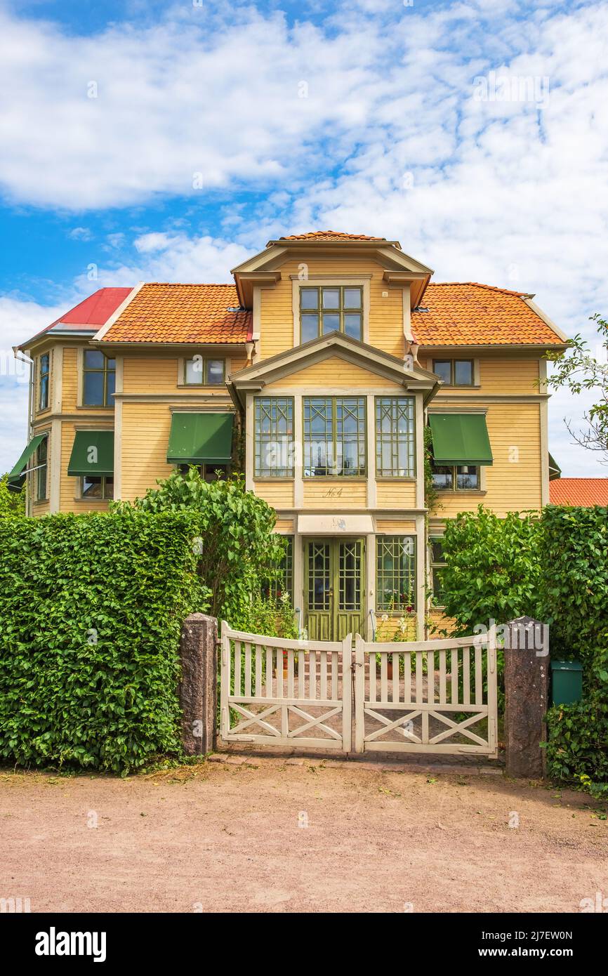 Idyllic old beautiful wooden house with a gate Stock Photo - Alamy