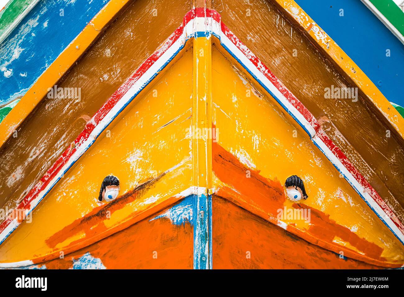 Luzzu boat in the process of being rubbed down before a repaint in ...
