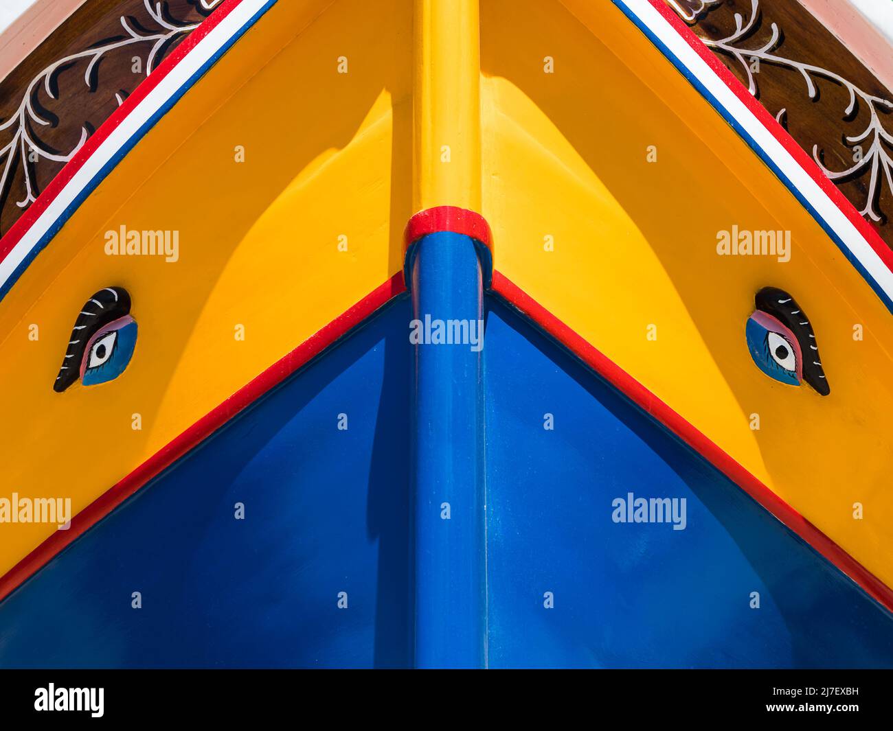 A beautiful Luzzu boat seen on the shore at Bugibba in Malta in May ...