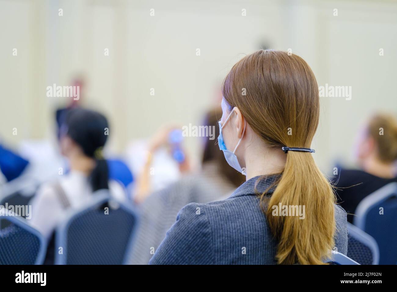 Audience watching presentation during business hi-res stock photography ...