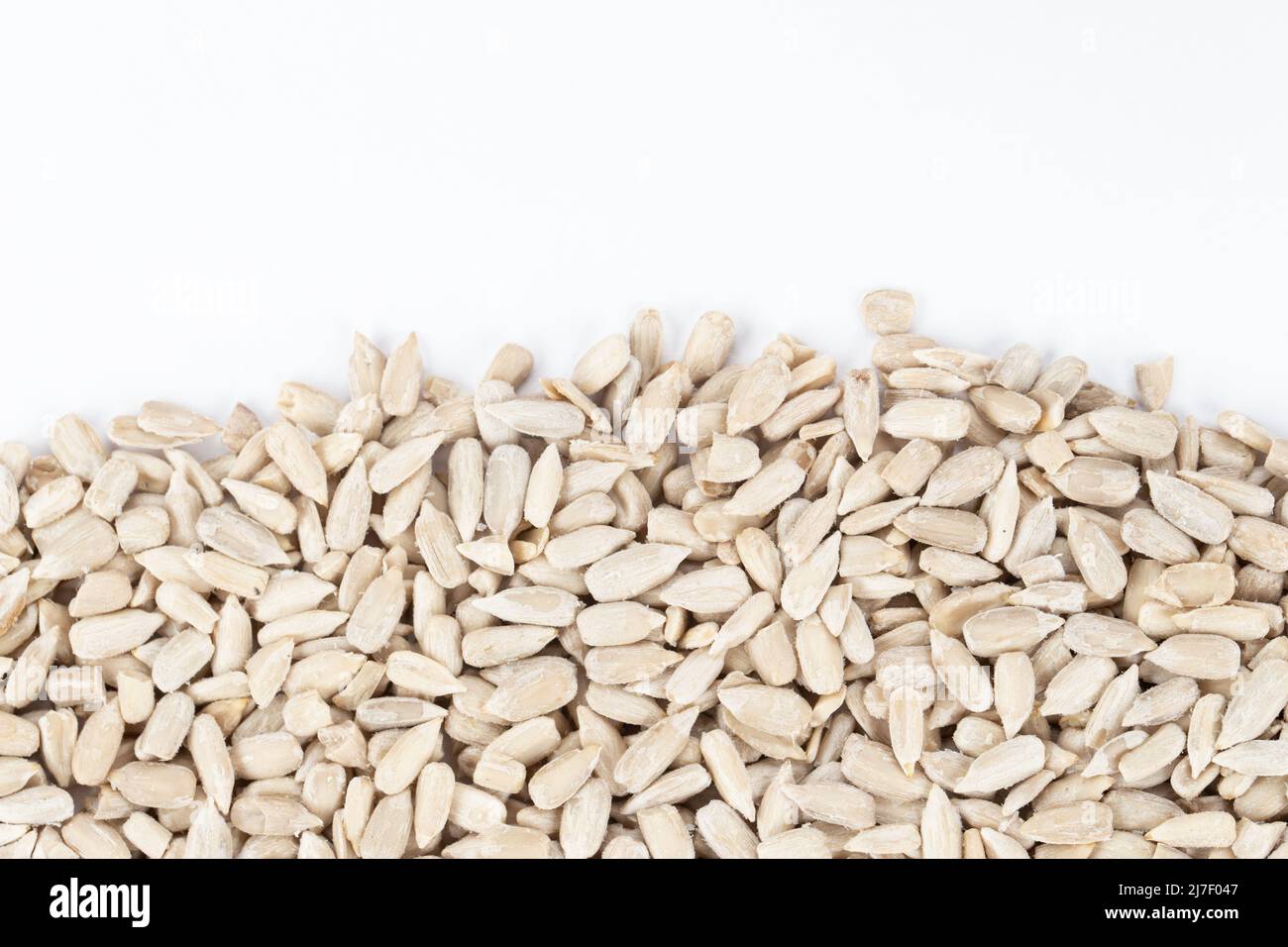 Sunflower seeds texture as background. Top view. Space for text Stock ...