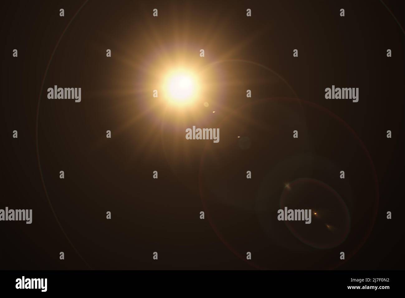 Abstract natural sun flare on the black Stock Photo - Alamy