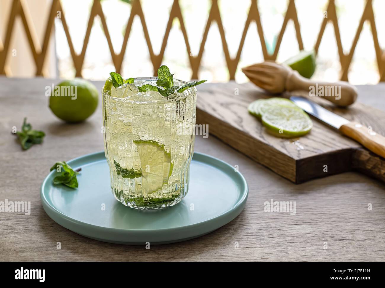 Homemade fizzy lime lemonade drink. Also mojito mocktail, or cocktail ...