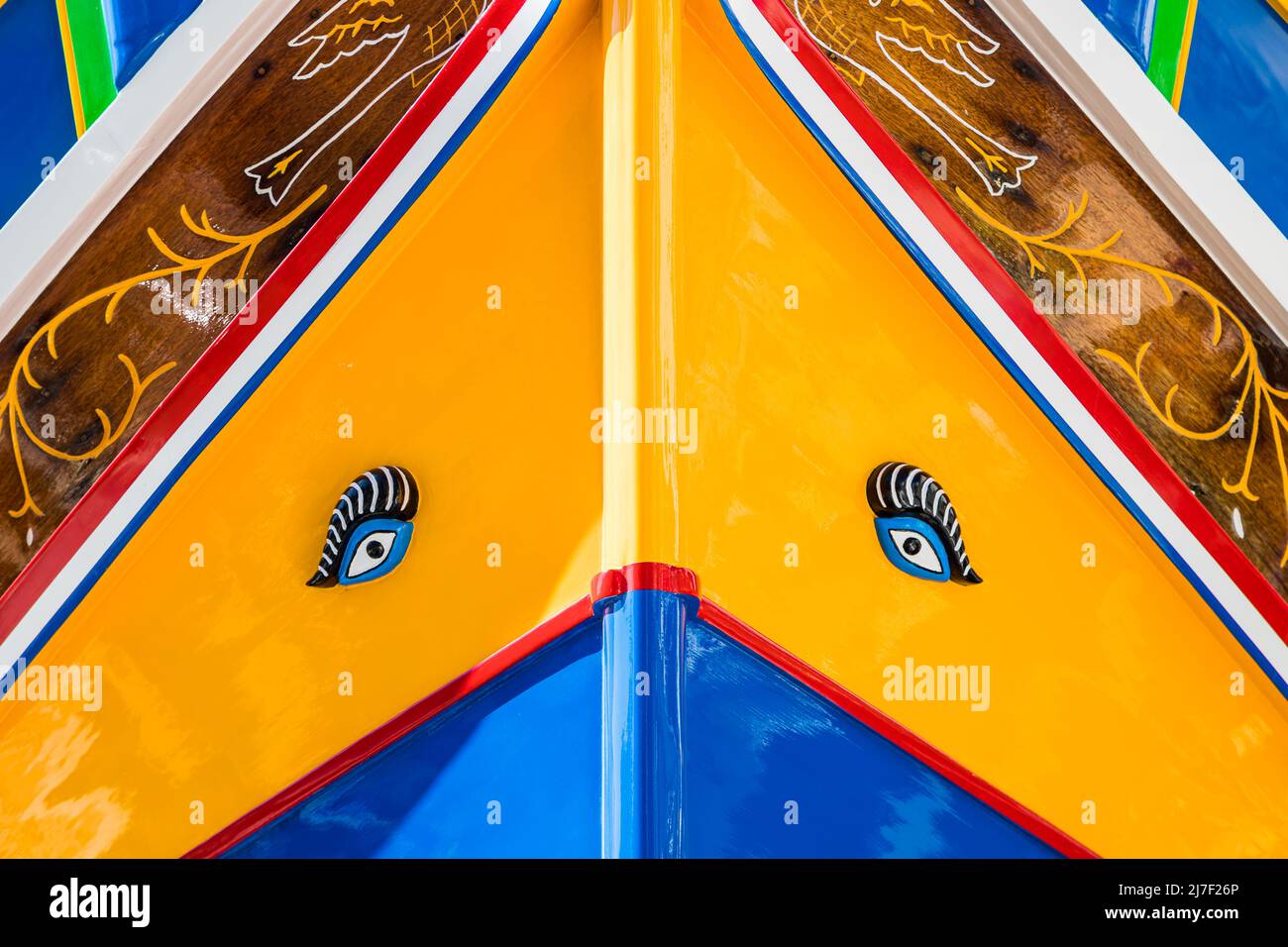 Extreme close up of a colourful Luzzu boat in Bugibba on the coast of ...