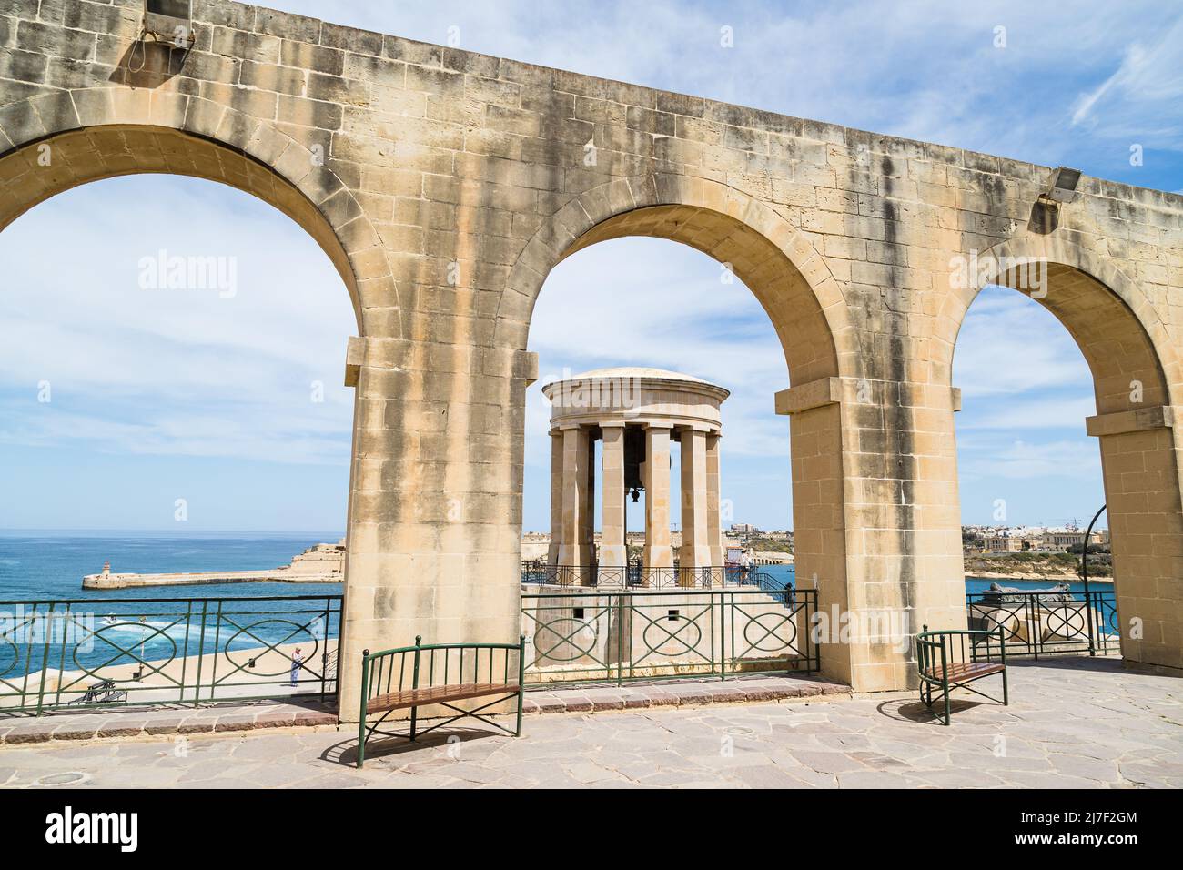 Siege Bell War Memorial seen through the arches of the Lower Barrakka ...