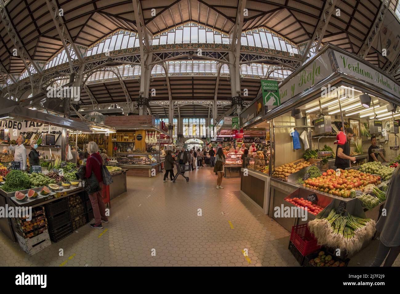 VALENCIA, SPAIN - MAY 3 2022 - The historic market full of customers ...
