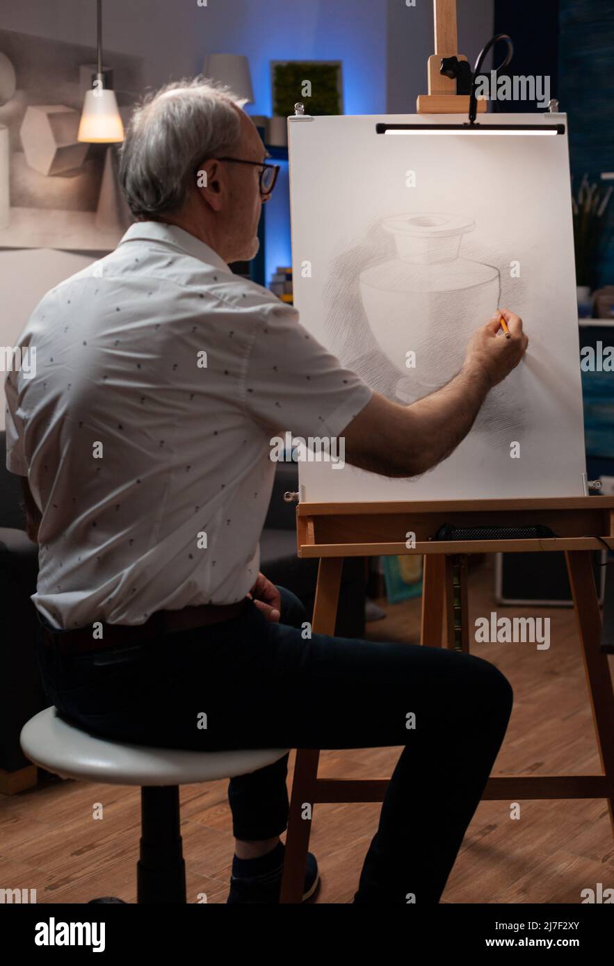Old man sitting on stool hi-res stock photography and images - Alamy