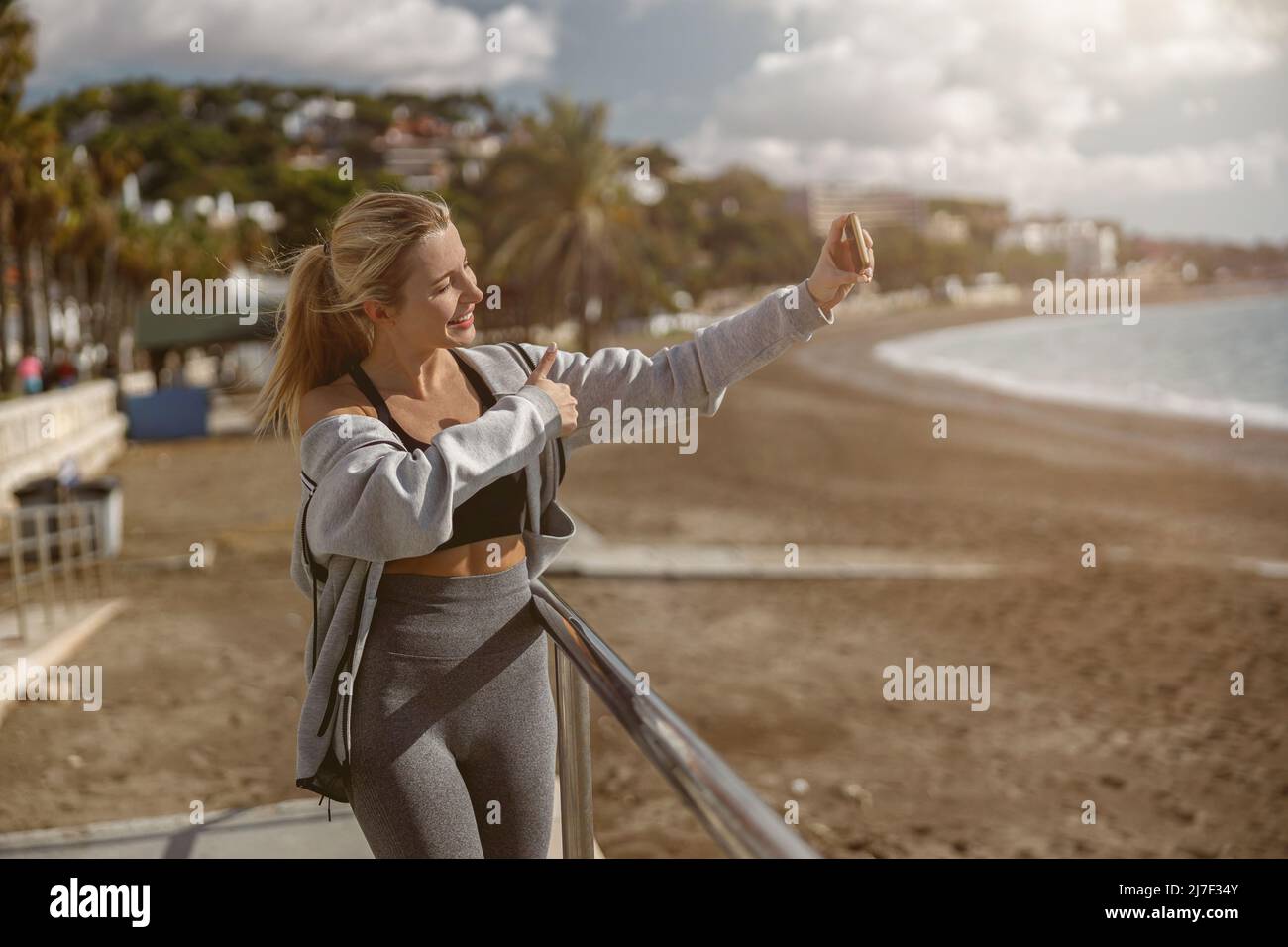 Caucasian fit female engaged in sports at sea Stock Photo - Alamy