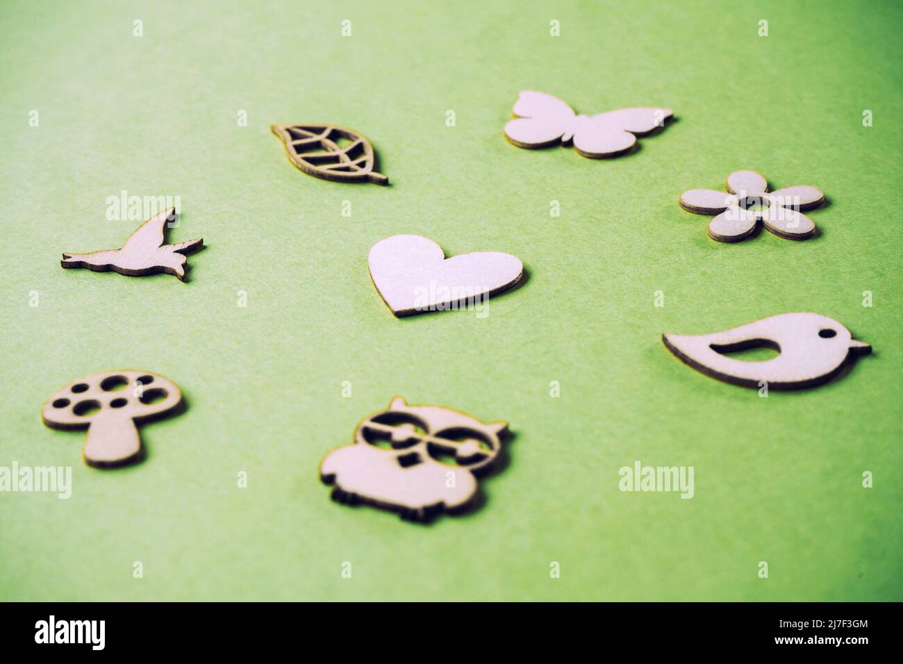 Conceptual image in green tones and wooden figures about ecosystem, the ...