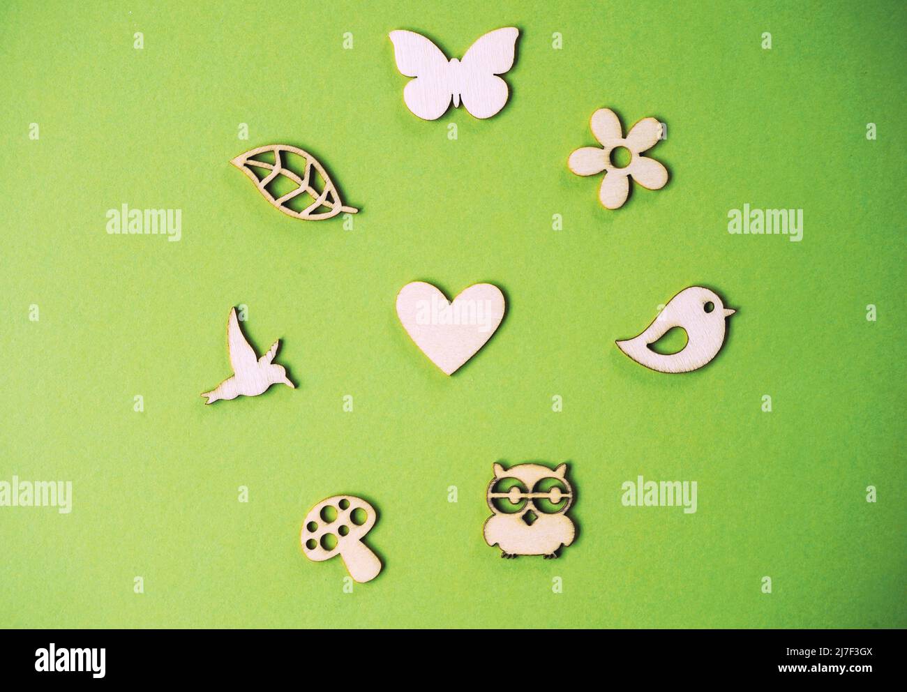 Conceptual image in green tones and wooden figures about ecosystem, the ...