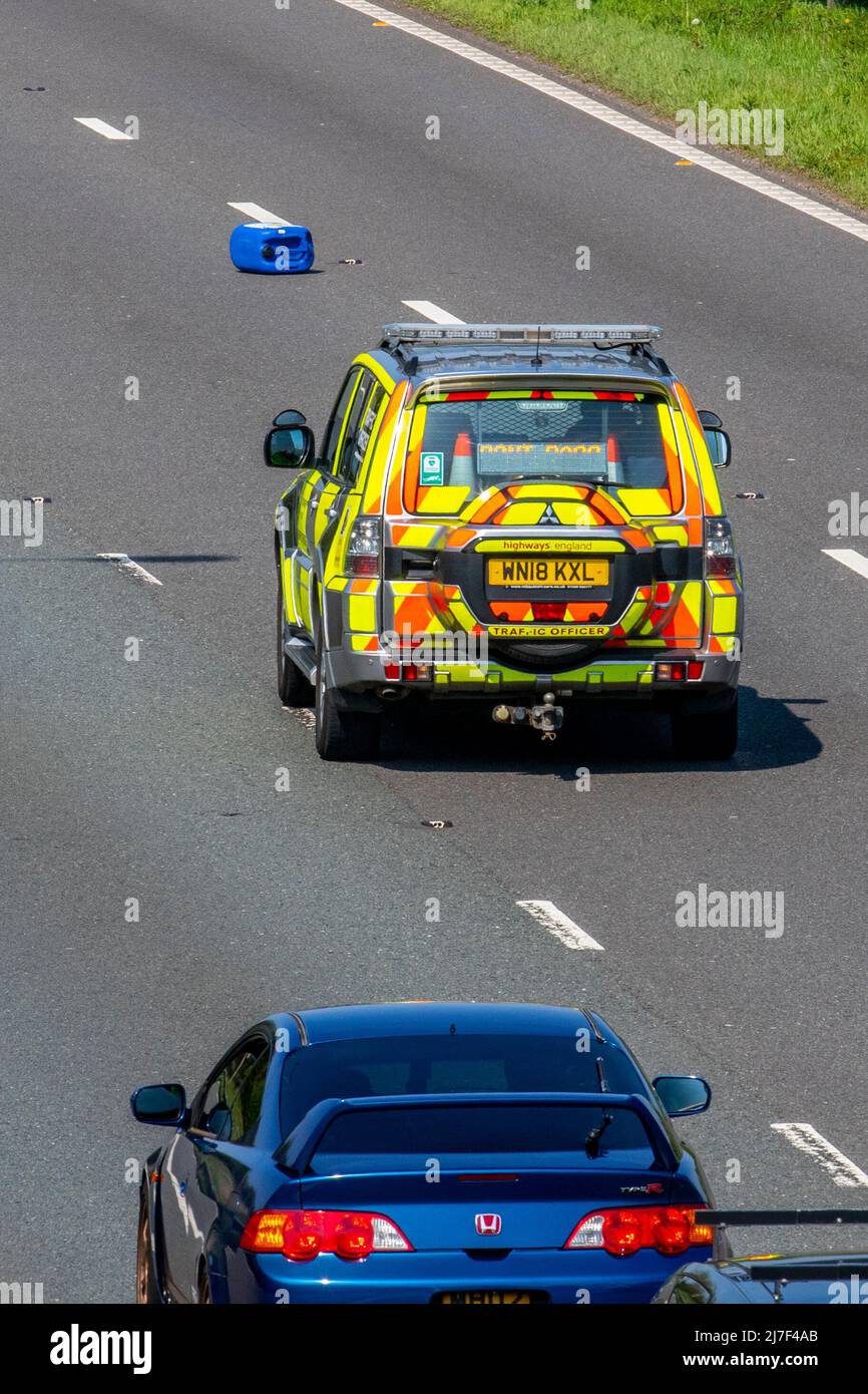 Motor obstruction being cleared by Traffic Officers having stopped ...