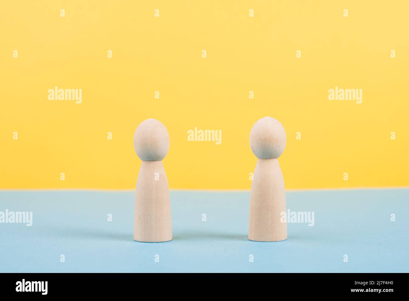Two people talking together, having a conversation, networking and ...