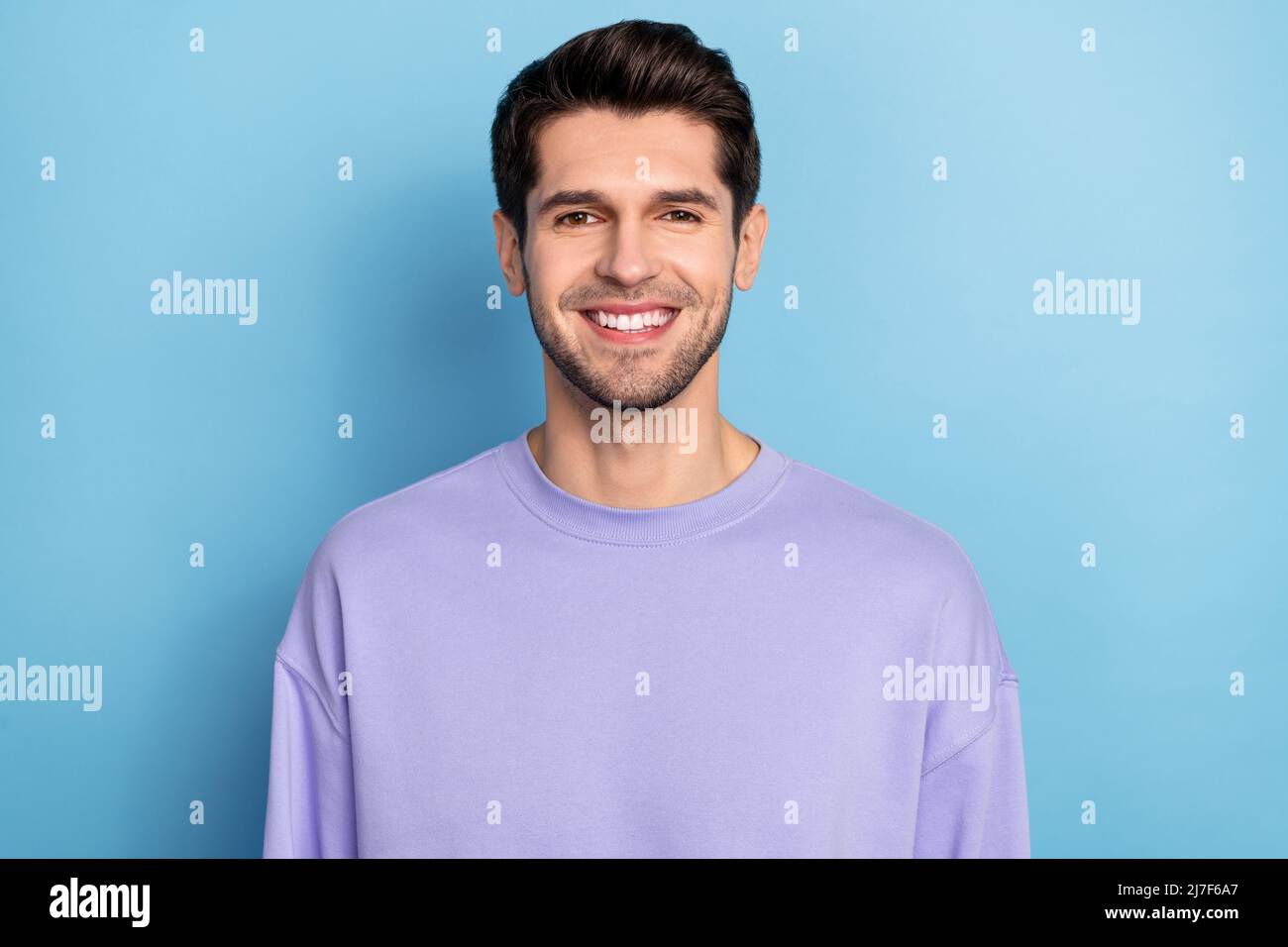 Photo of optimistic millennial brunet guy wear sweatshirt isolated on ...