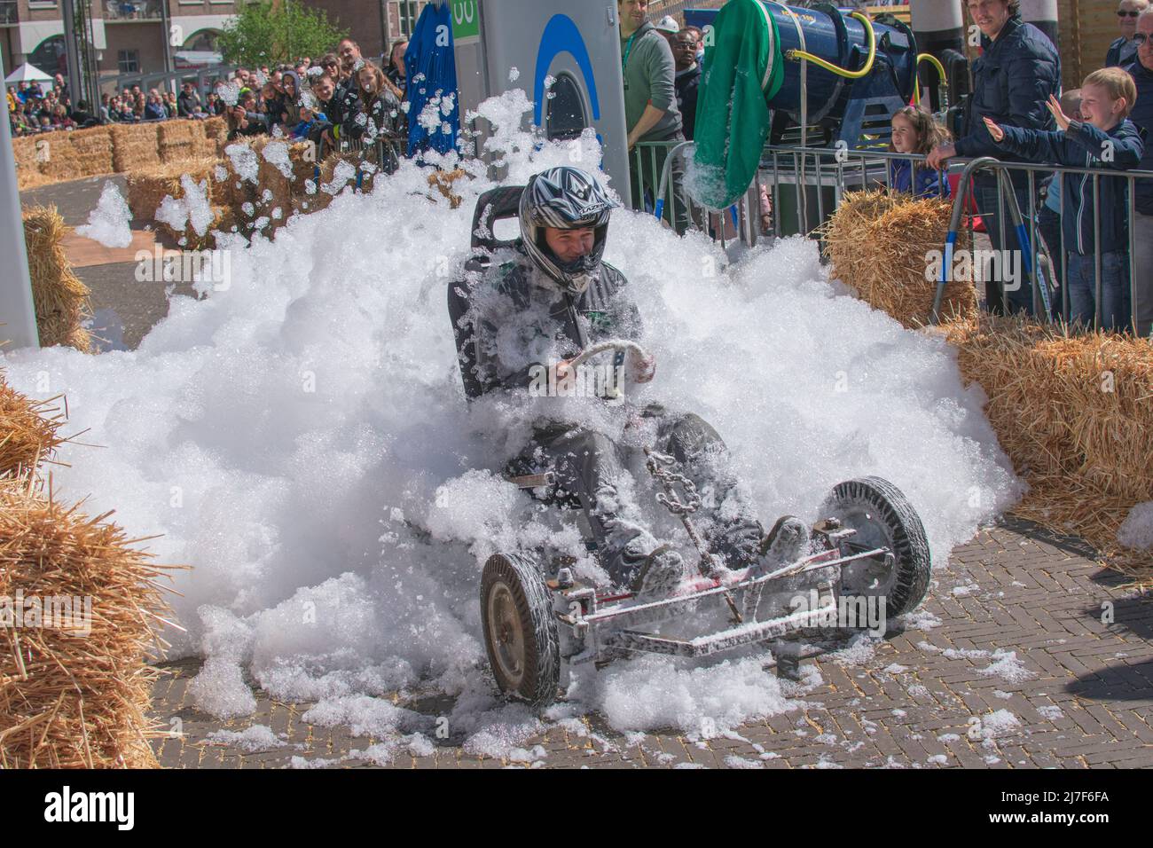 Sint Niklaas, Belgium, May 05, 2019, Man drives a custom go-kart ...