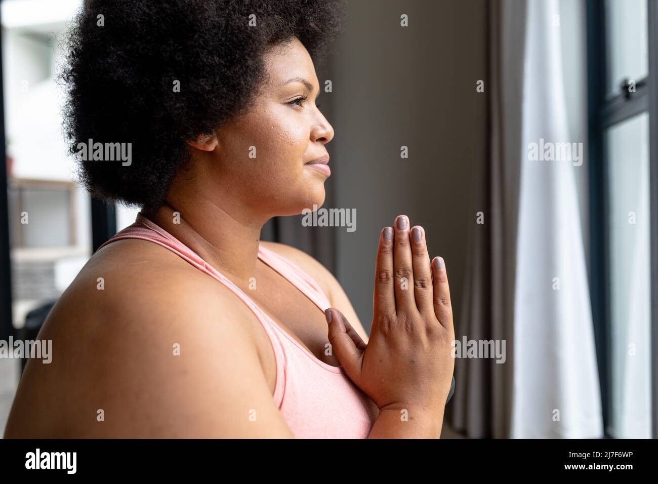 African woman side view sitting hi-res stock photography and images - Alamy