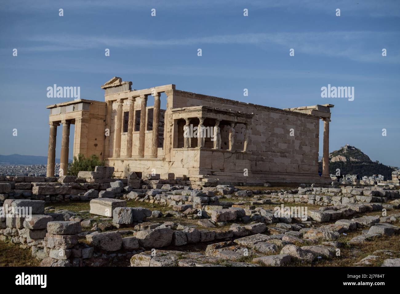 Tourists visit the Parthenon at the Athens' Acropolis archaeological site following the ease of ...