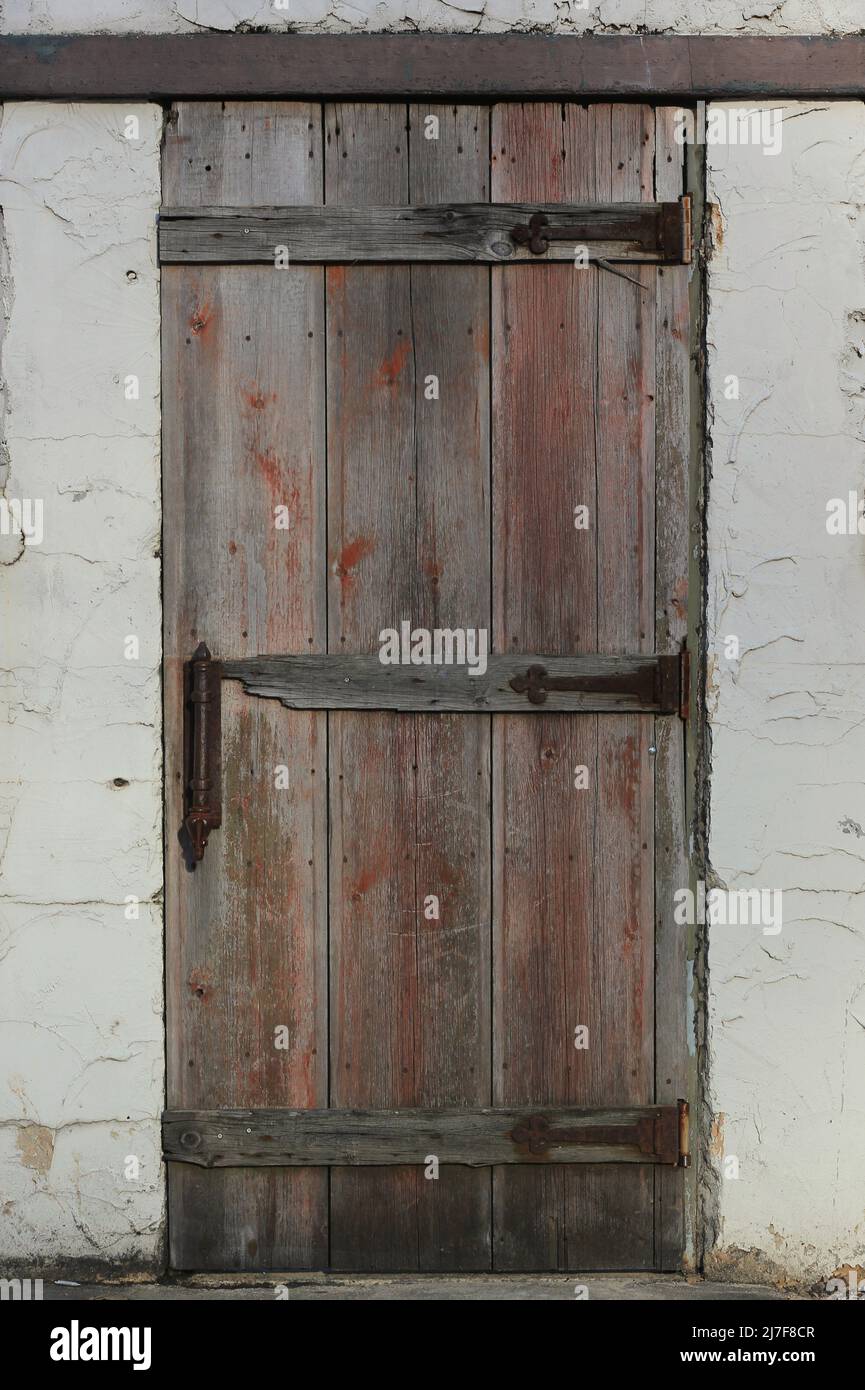Vintage worn wooden door Stock Photo - Alamy