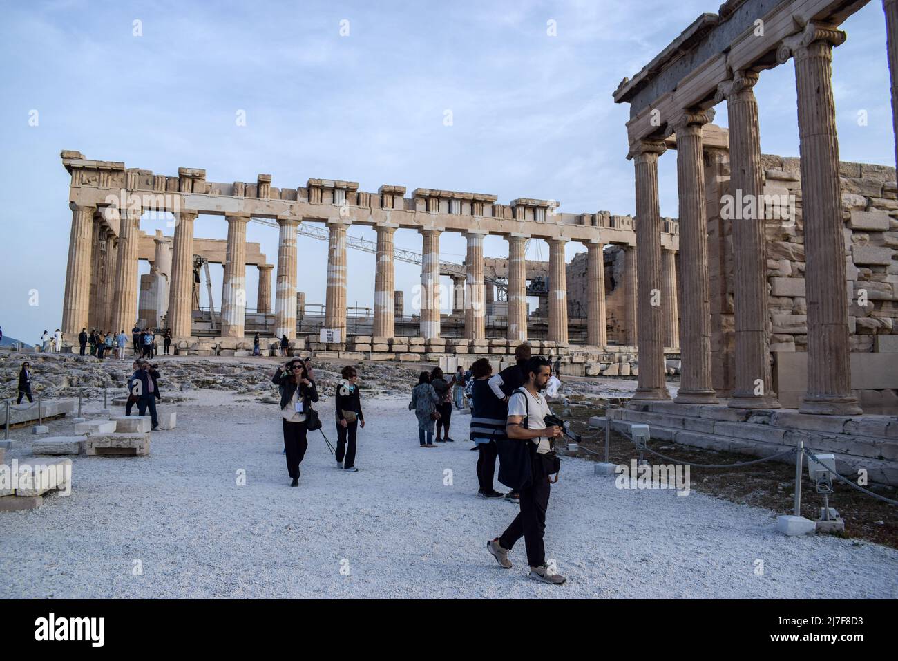 Tourists visit the Parthenon at the Athens' Acropolis archaeological site following the ease of ...
