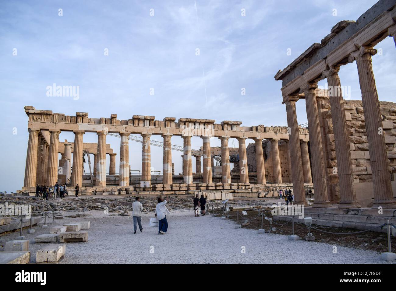 Tourists visit the Parthenon at the Athens' Acropolis archaeological site following the ease of ...