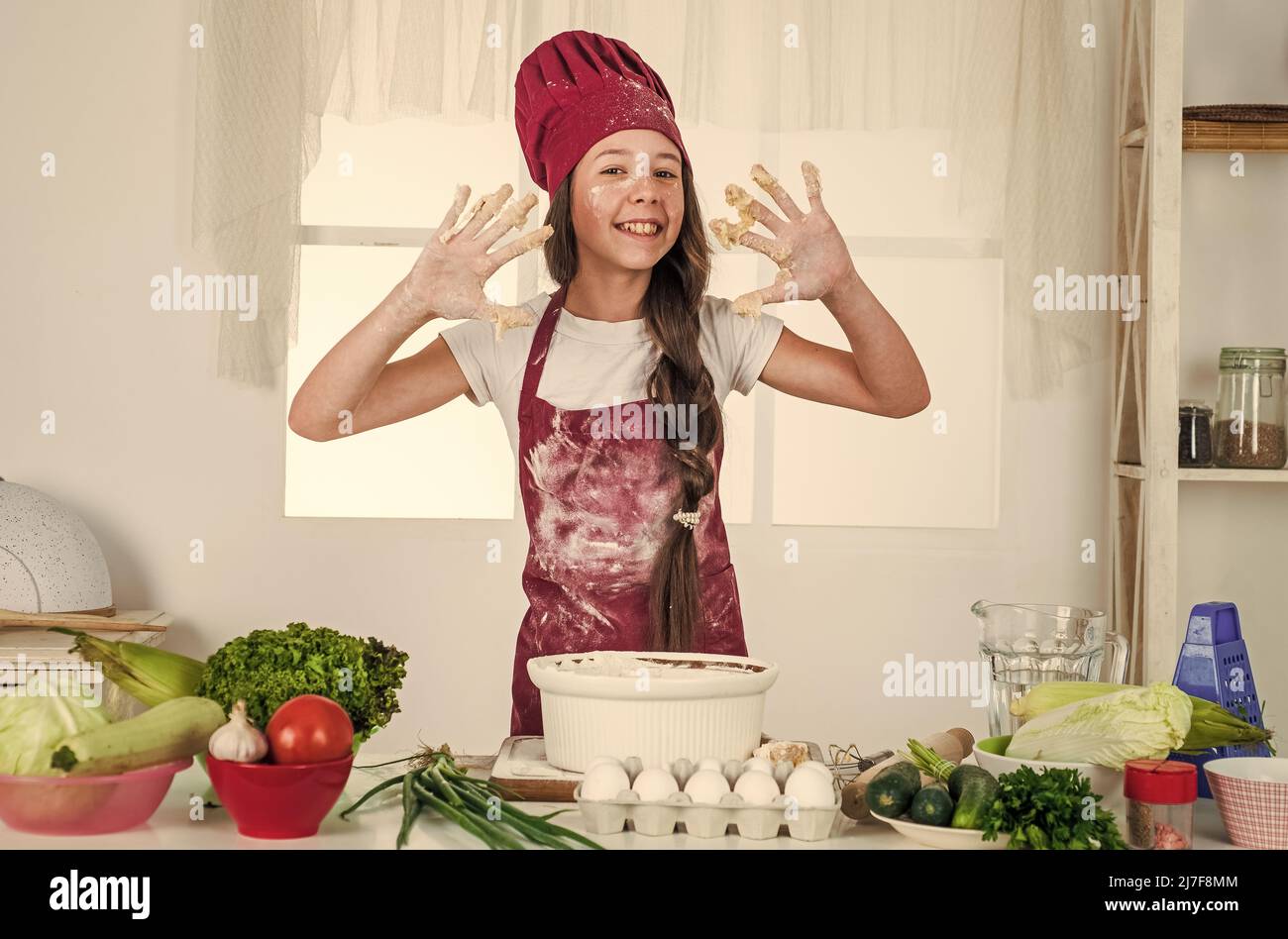 culinary and cuisine. happy childhood. happy child wear cook uniform ...