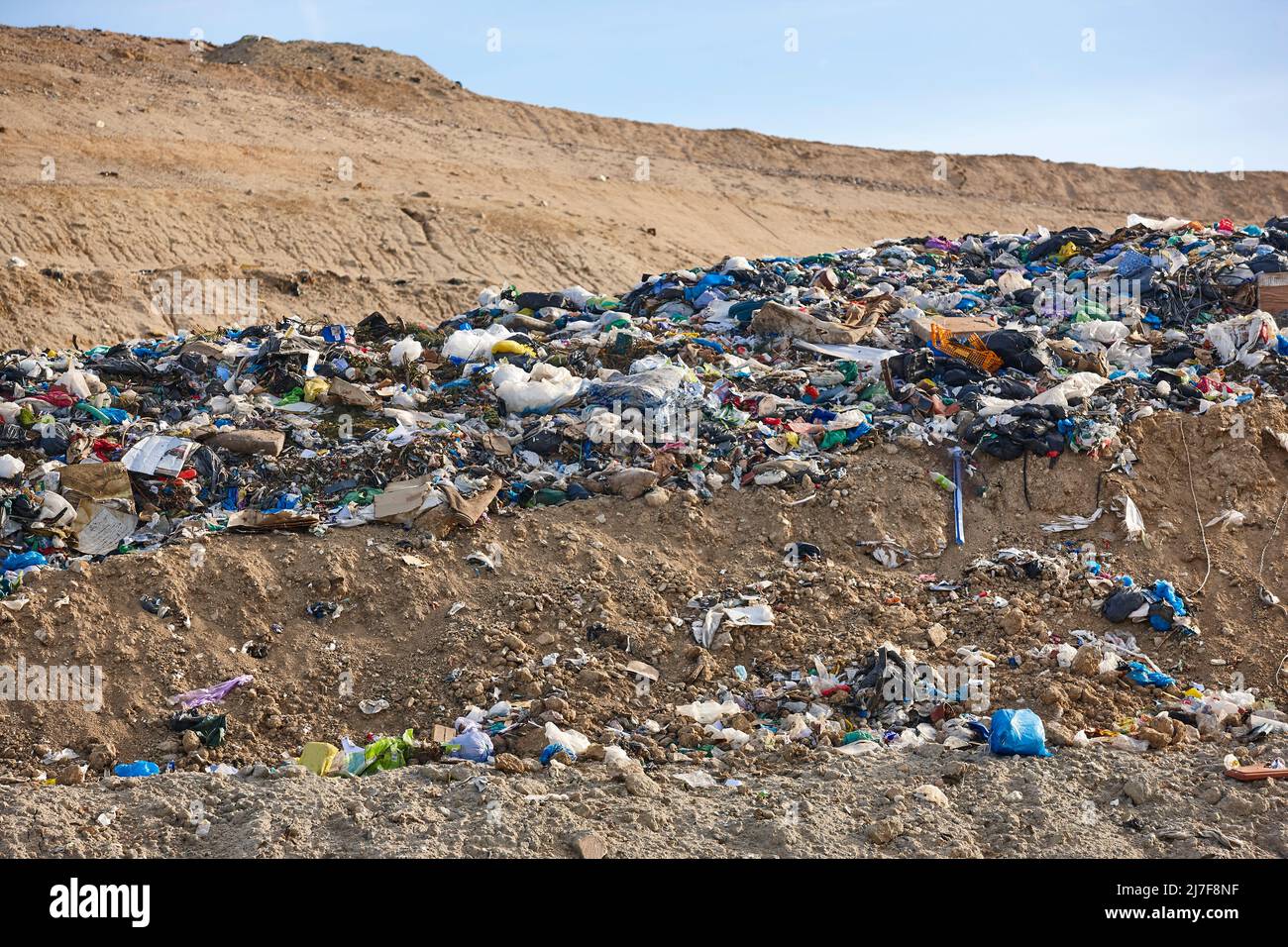 Open air garbage dump. Plastic pollution. Recycling junk. Consumerism ...