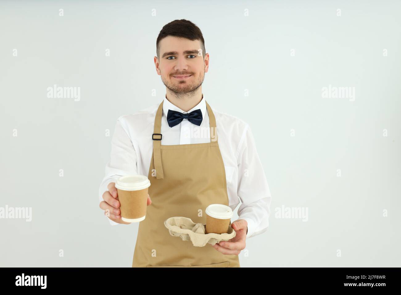 Concept of occupation, young waiter on light background Stock Photo - Alamy