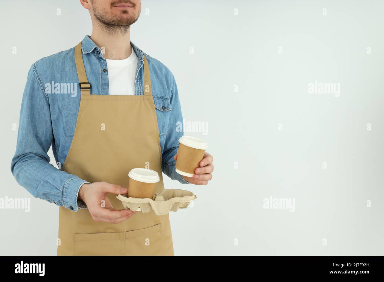 Concept of occupation, young waiter on light background Stock Photo - Alamy