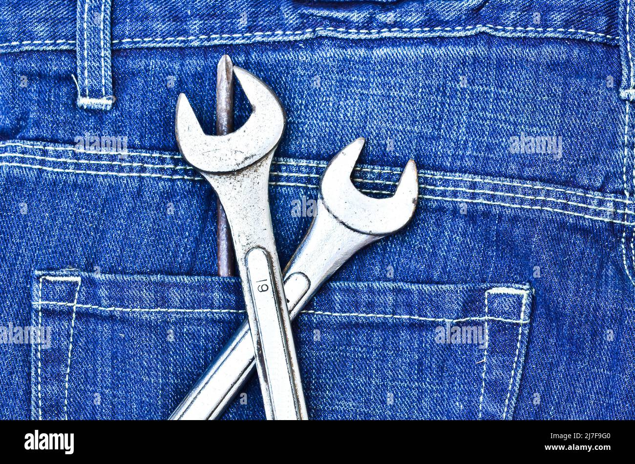 Construction tools in jeans hi-res stock photography and images - Alamy