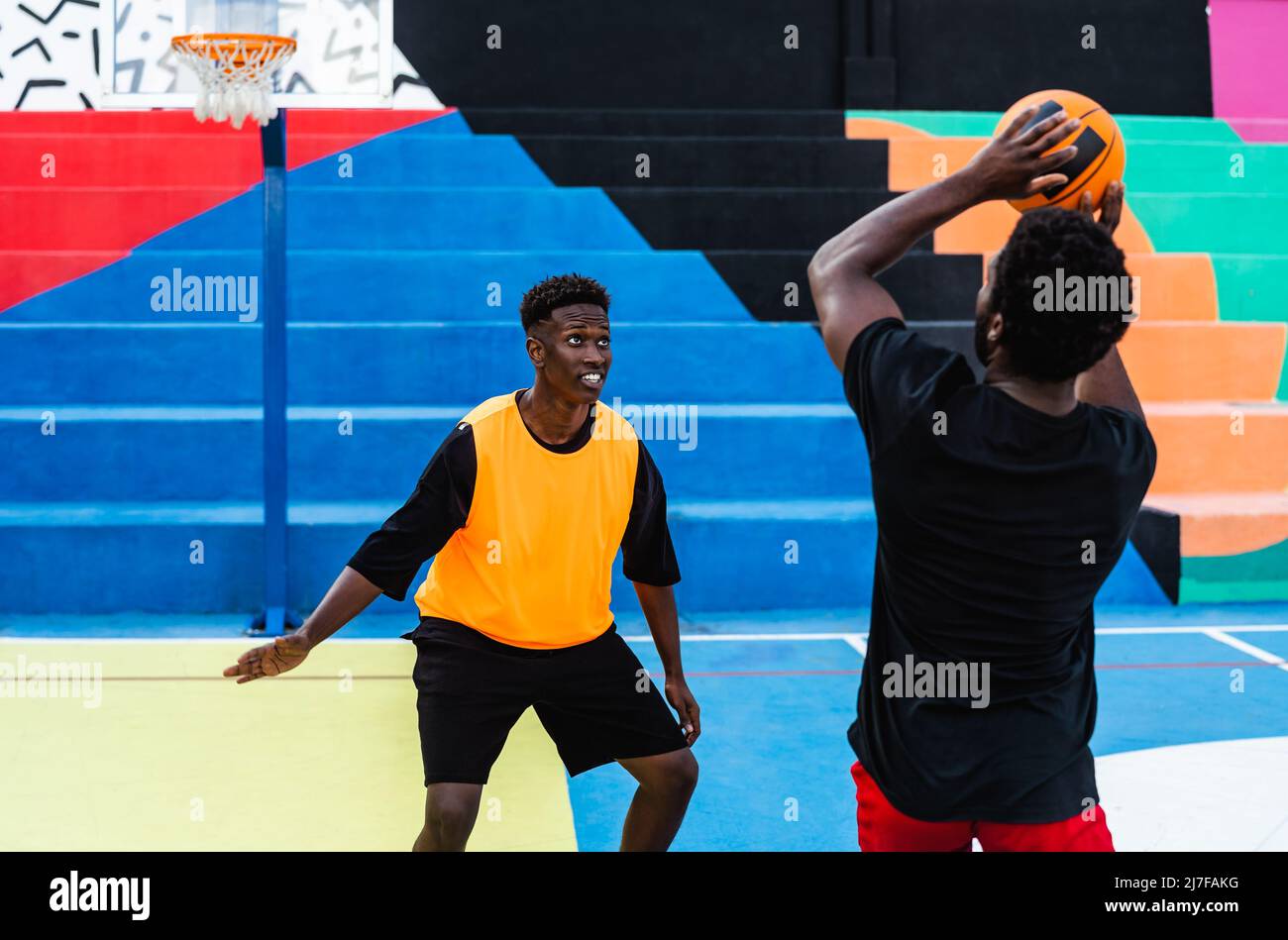 Young friends playing basketball outdoor - Urban sport lifestyle ...