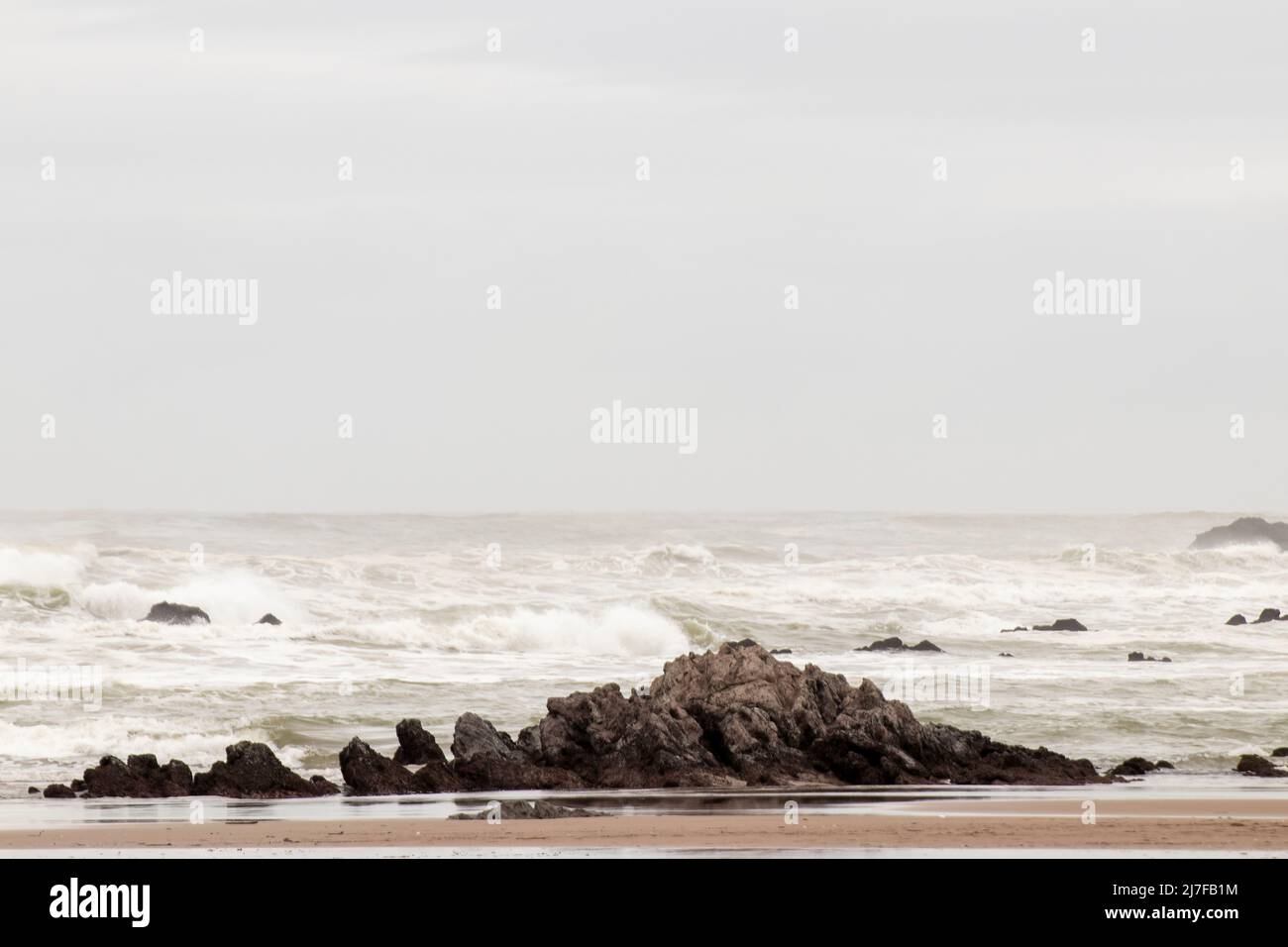 rock formation on the coast of the basque country on the sopelana beach ...