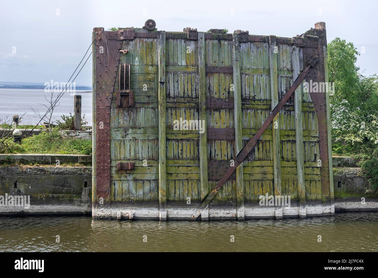 Old disused lock gates from the Manchester ship canal Stock Photo - Alamy