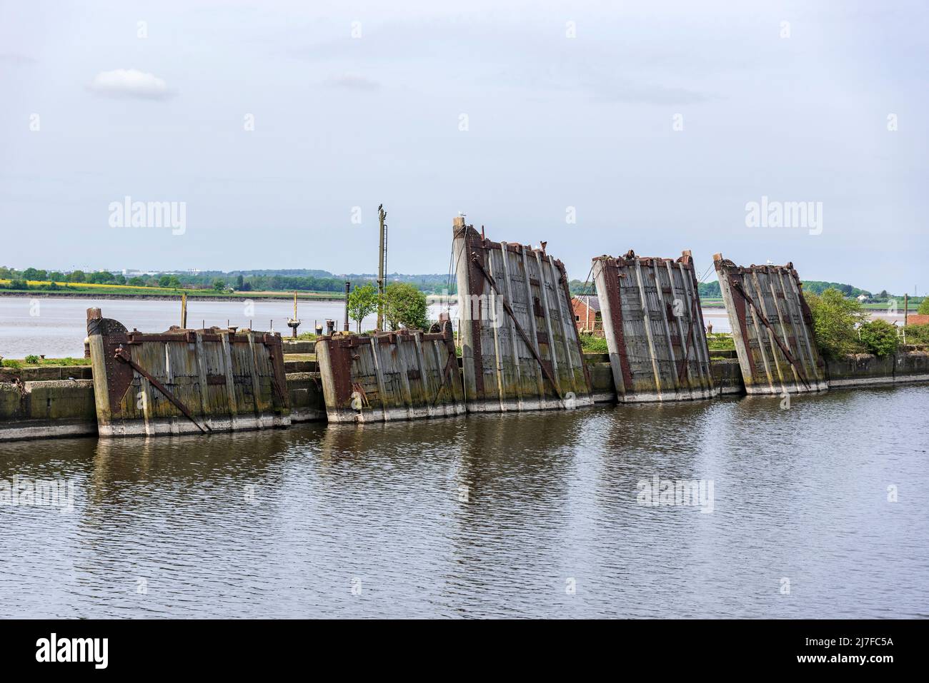 Old disused lock gates from the Manchester ship canal Stock Photo - Alamy
