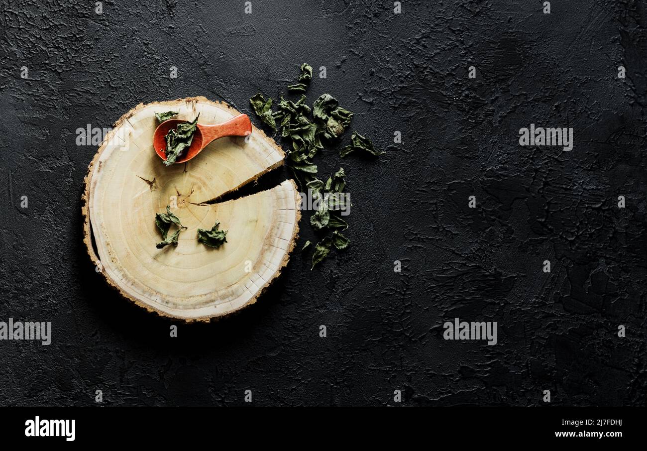 dry mint on a wooden tray. herbal tea. natural spice. copy space Stock ...
