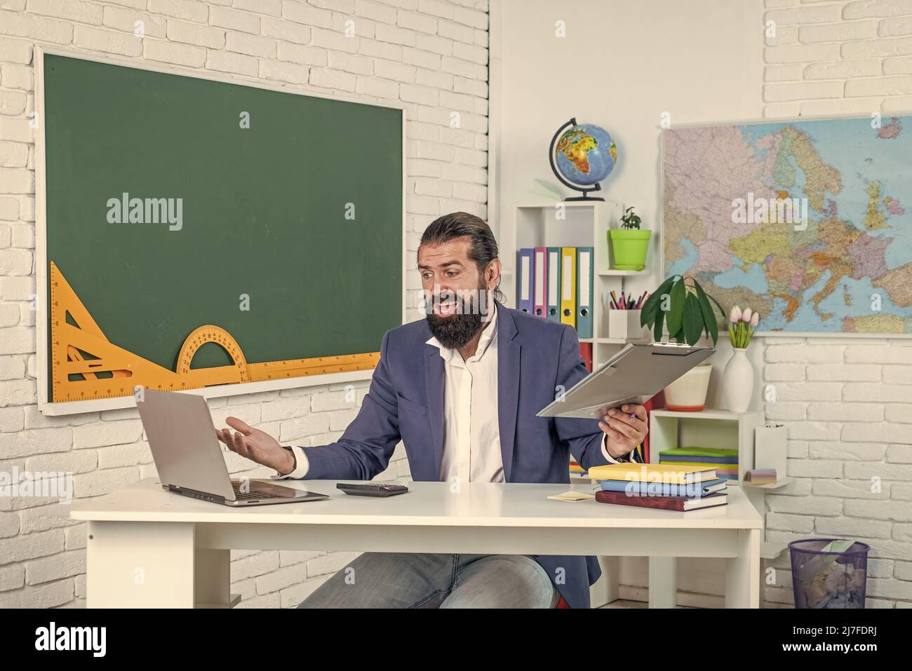 Widening your Knowledge. informal education. male student sit in school ...