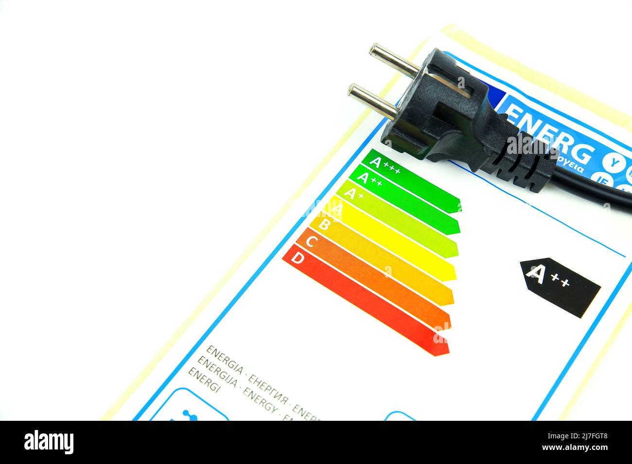 European Union Energy Label next to black pin power plug Stock Photo ...